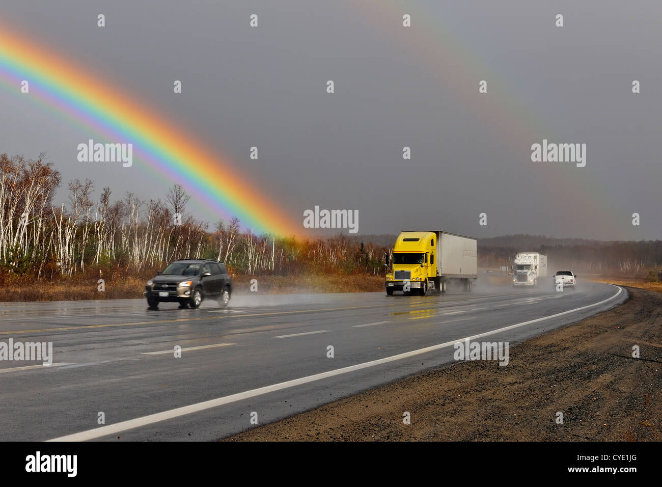 Receding storm clouds and rainbow, Greater Sudbury, Ontario, Canada ...