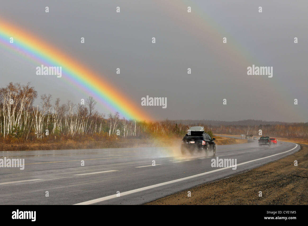 Receding storm clouds and rainbow, Greater Sudbury, Ontario, Canada ...
