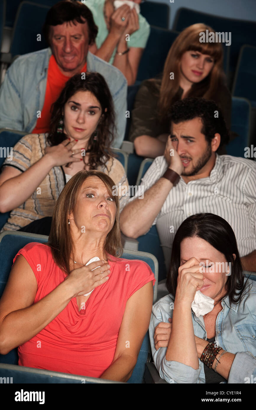 Group of 7 emotional male and female spectators weep Stock Photo - Alamy