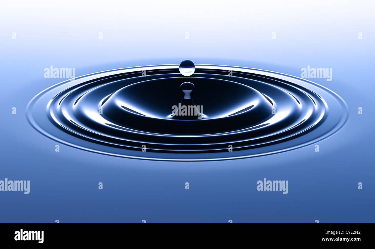 Water drop falling into water Stock Photo - Alamy