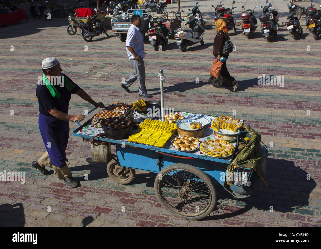 Uyghur Man Pulling A Mobile Food Stall, Yarkand, Xinjiang Uyghur ...