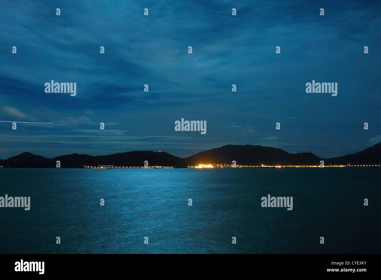 Full moon light over the ocean Stock Photo - Alamy