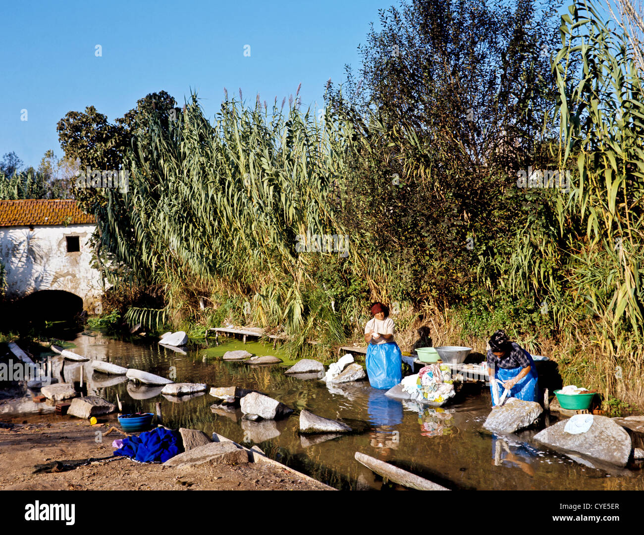 Washing clothes in river hi-res stock photography and images - Alamy
