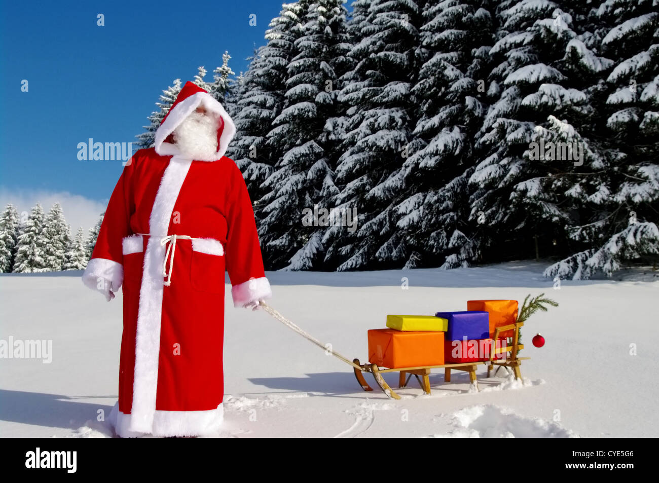 Santa Claus, Father Christmas with colorful presents on a sledge Stock ...
