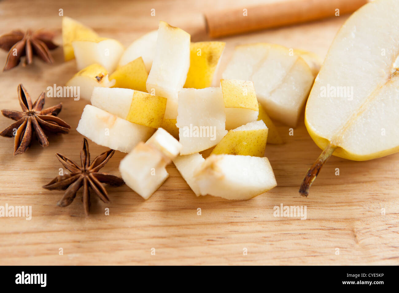 Pear cut into slices and half, close up Stock Photo - Alamy