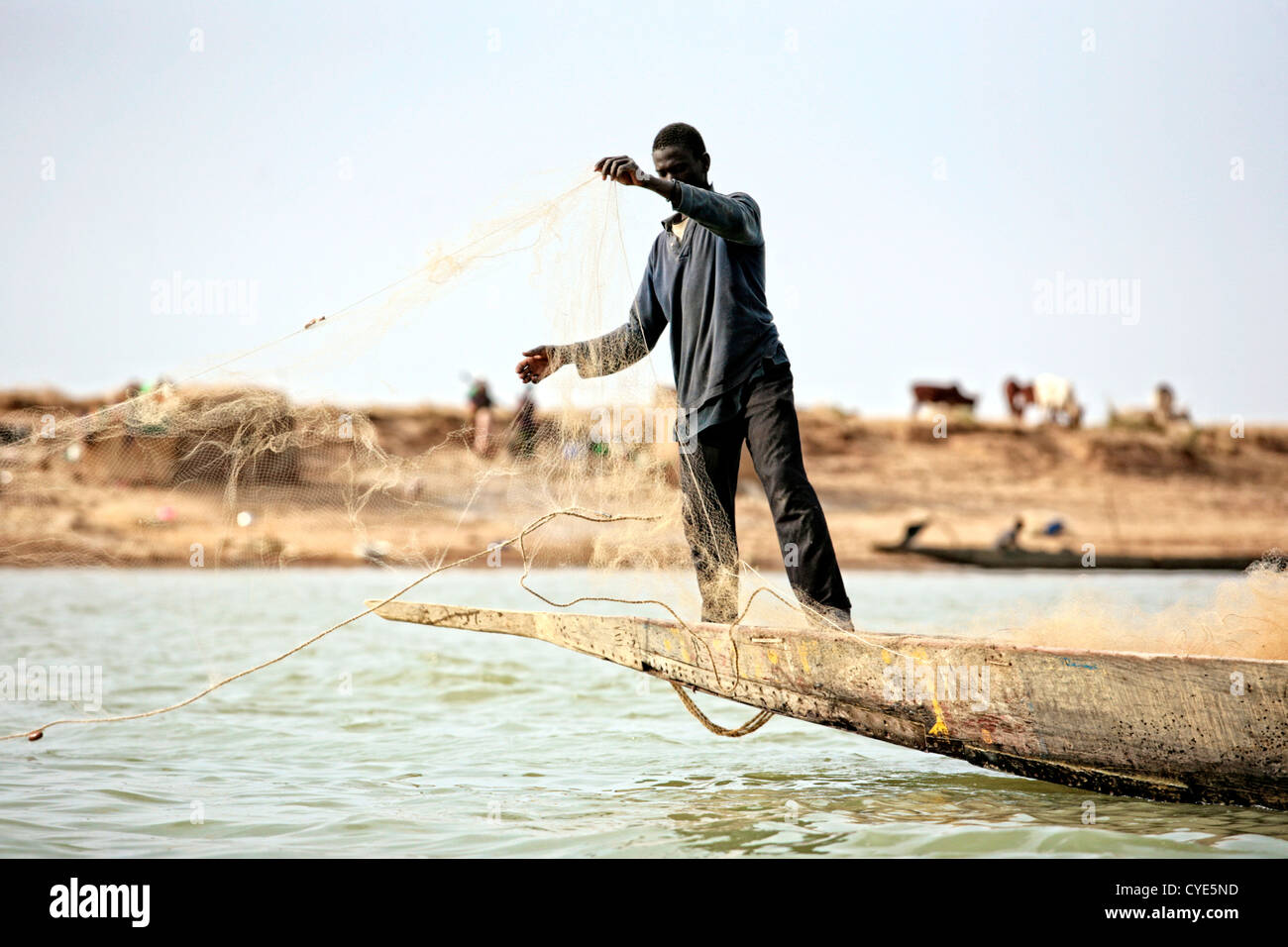 Fisherman at work Stock Photo - Alamy