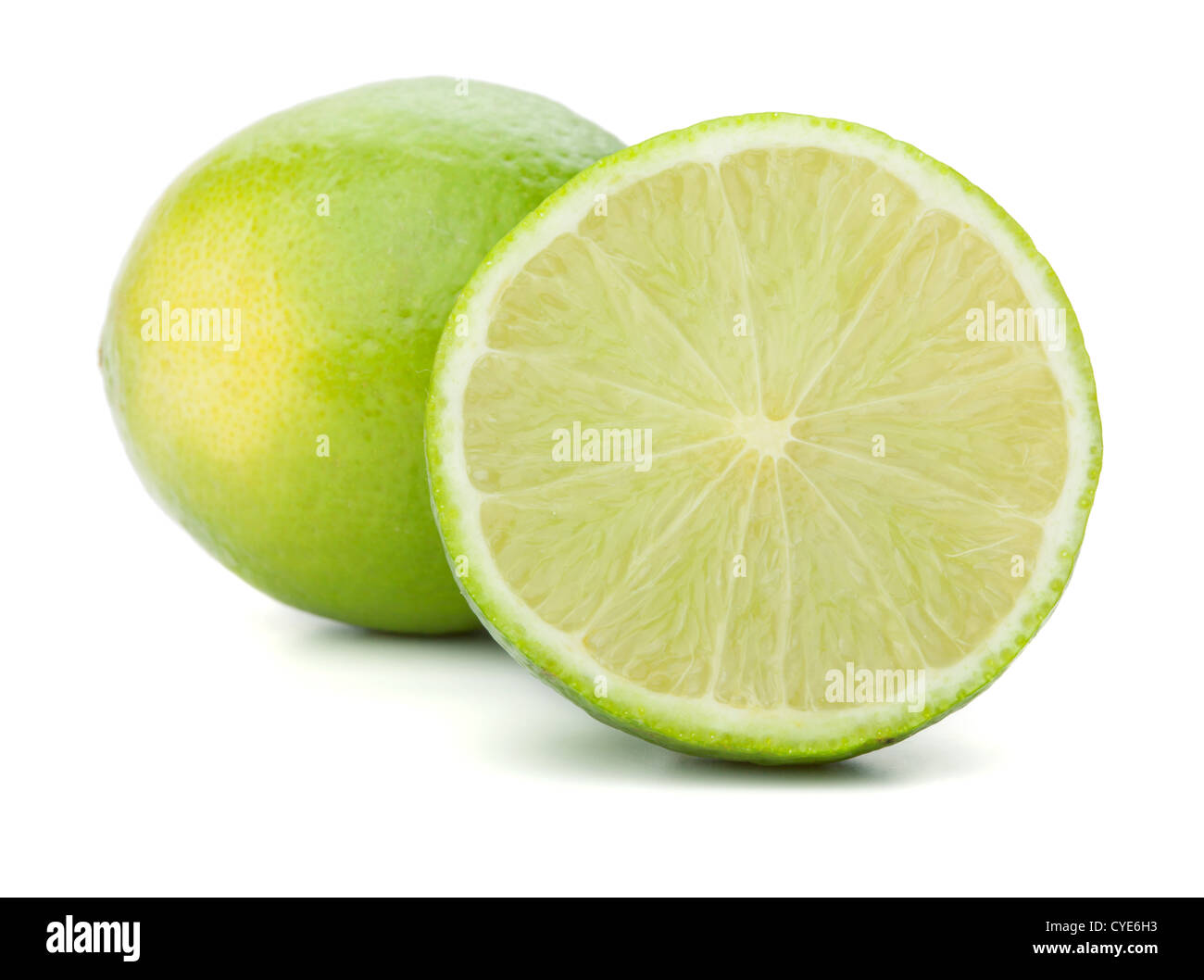 Whole and half lime. Isolated on white background Stock Photo - Alamy