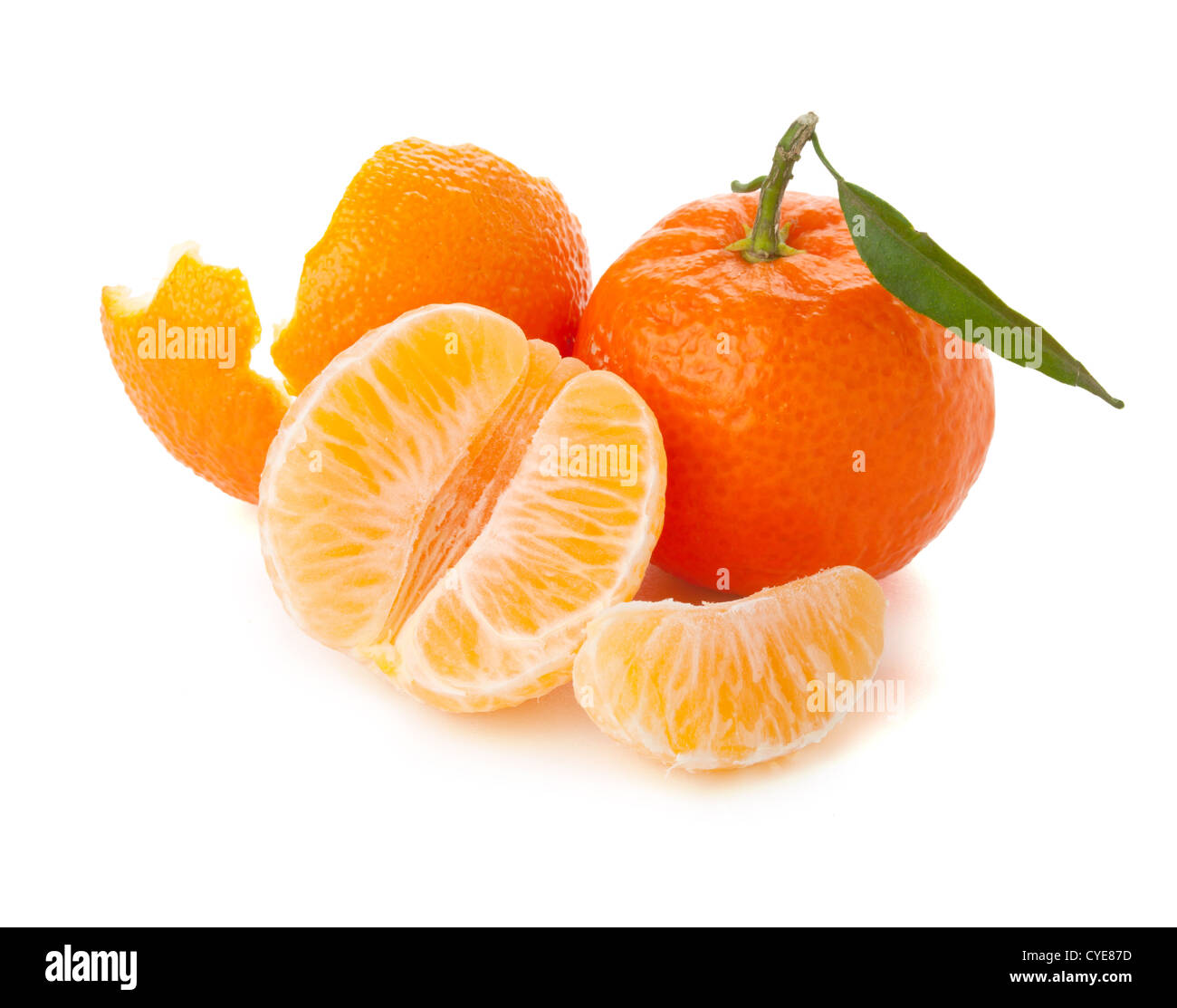 Ripe tangerine with green leaf. Isolated on white Stock Photo - Alamy