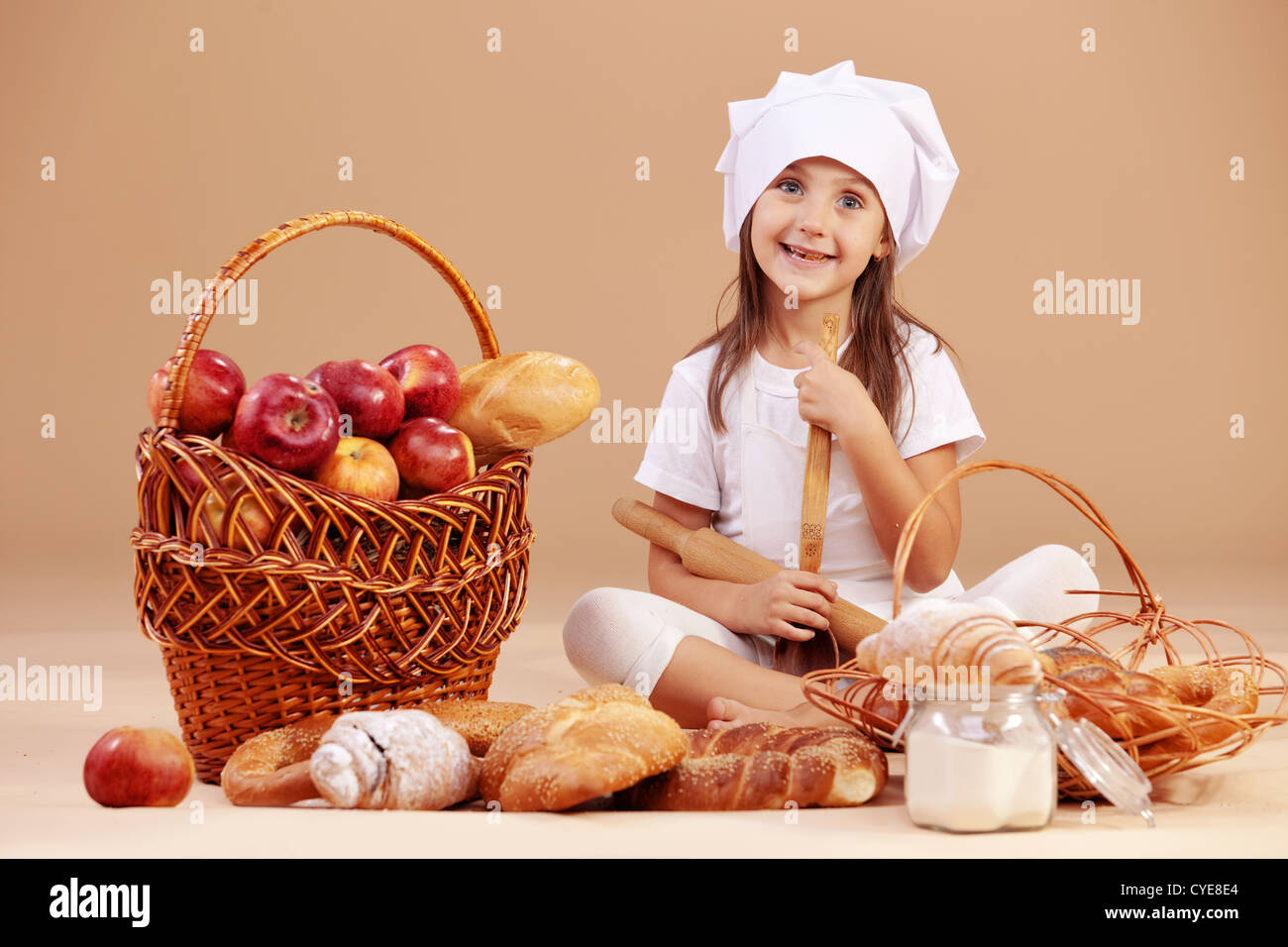 Little cute baker Stock Photo - Alamy