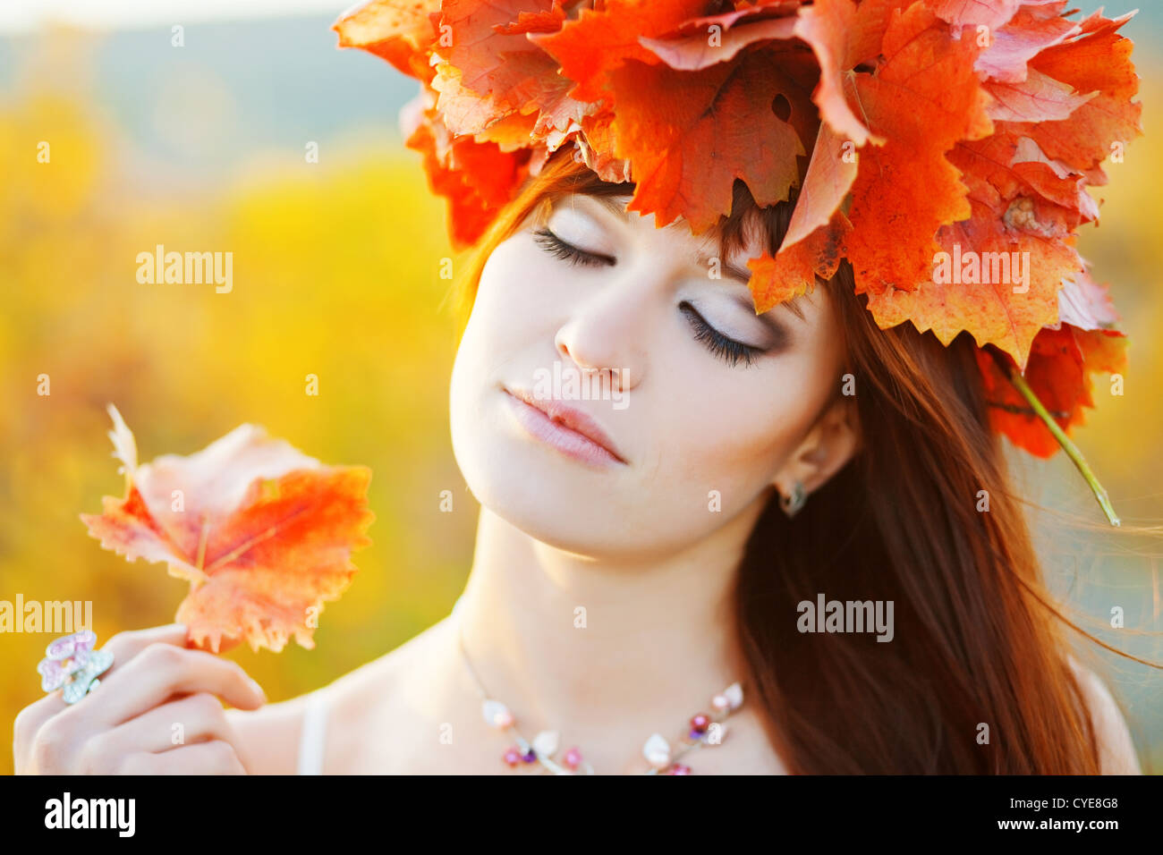Vibrant fall portrait of beautiful female close-up Stock Photo - Alamy
