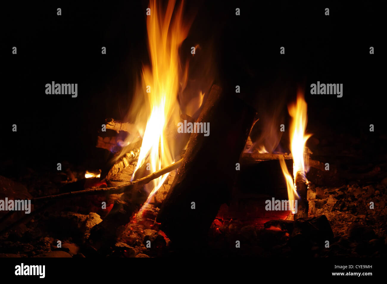a nice campfire burning outside Stock Photo - Alamy