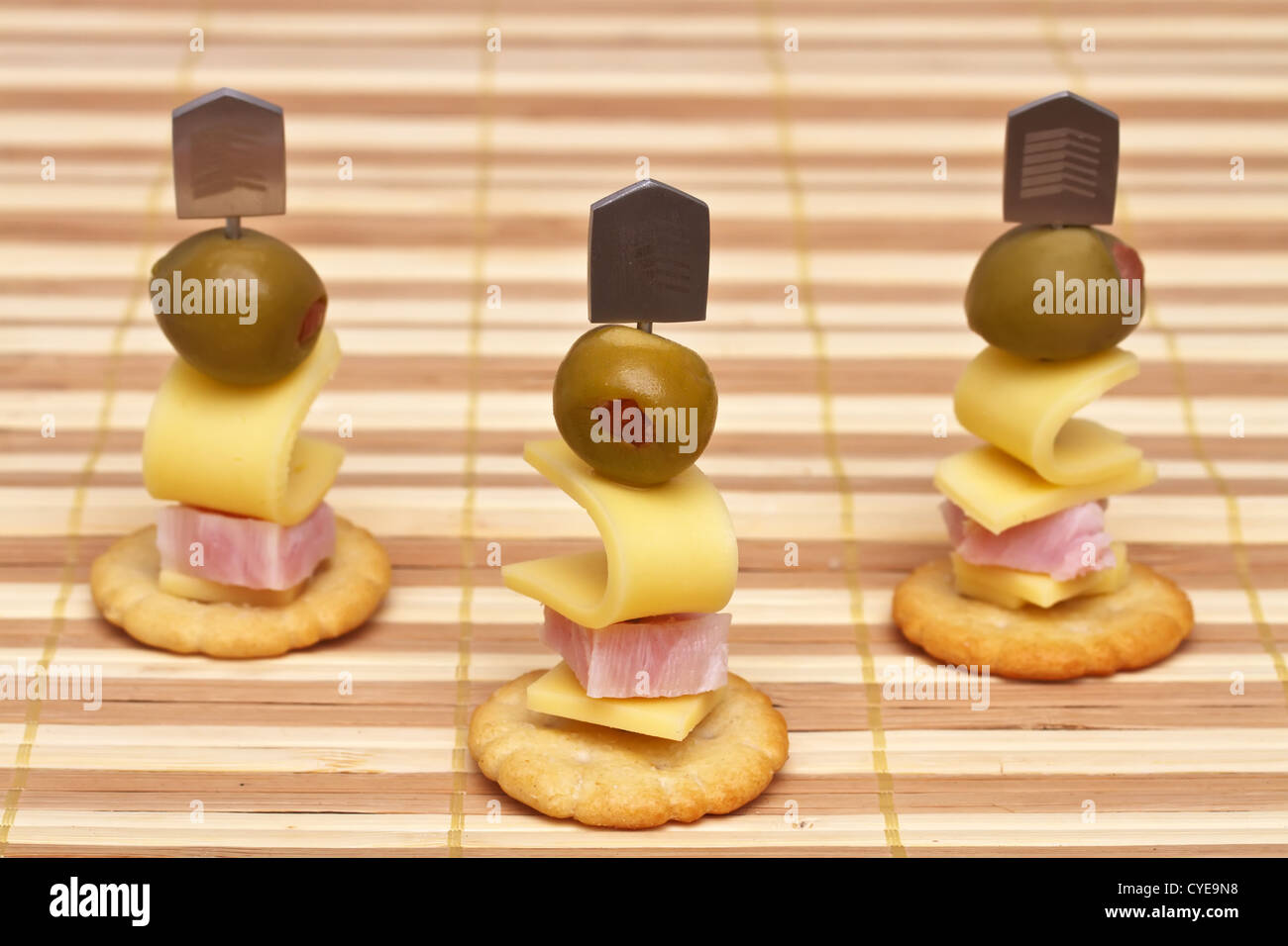 Canapes with ham and cheese Stock Photo - Alamy