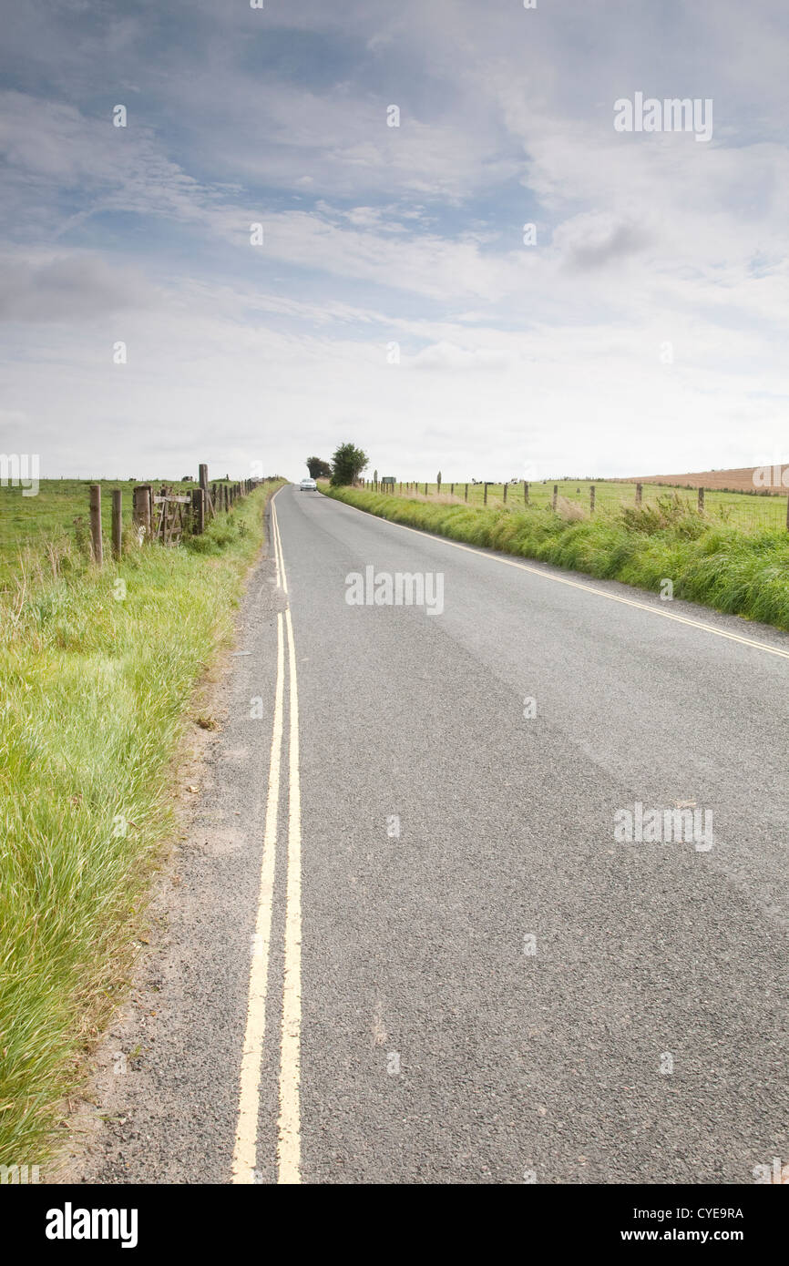 Open Road with Car in Distance Stock Photo - Alamy