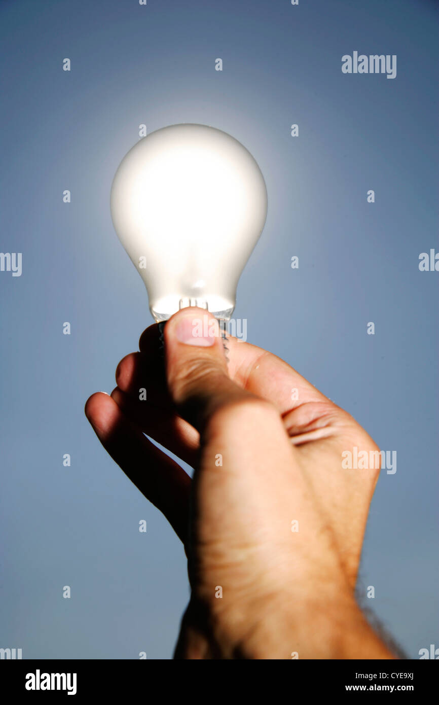 Global Concept of Green Energy Solutions With Light bulb and Planet on ...