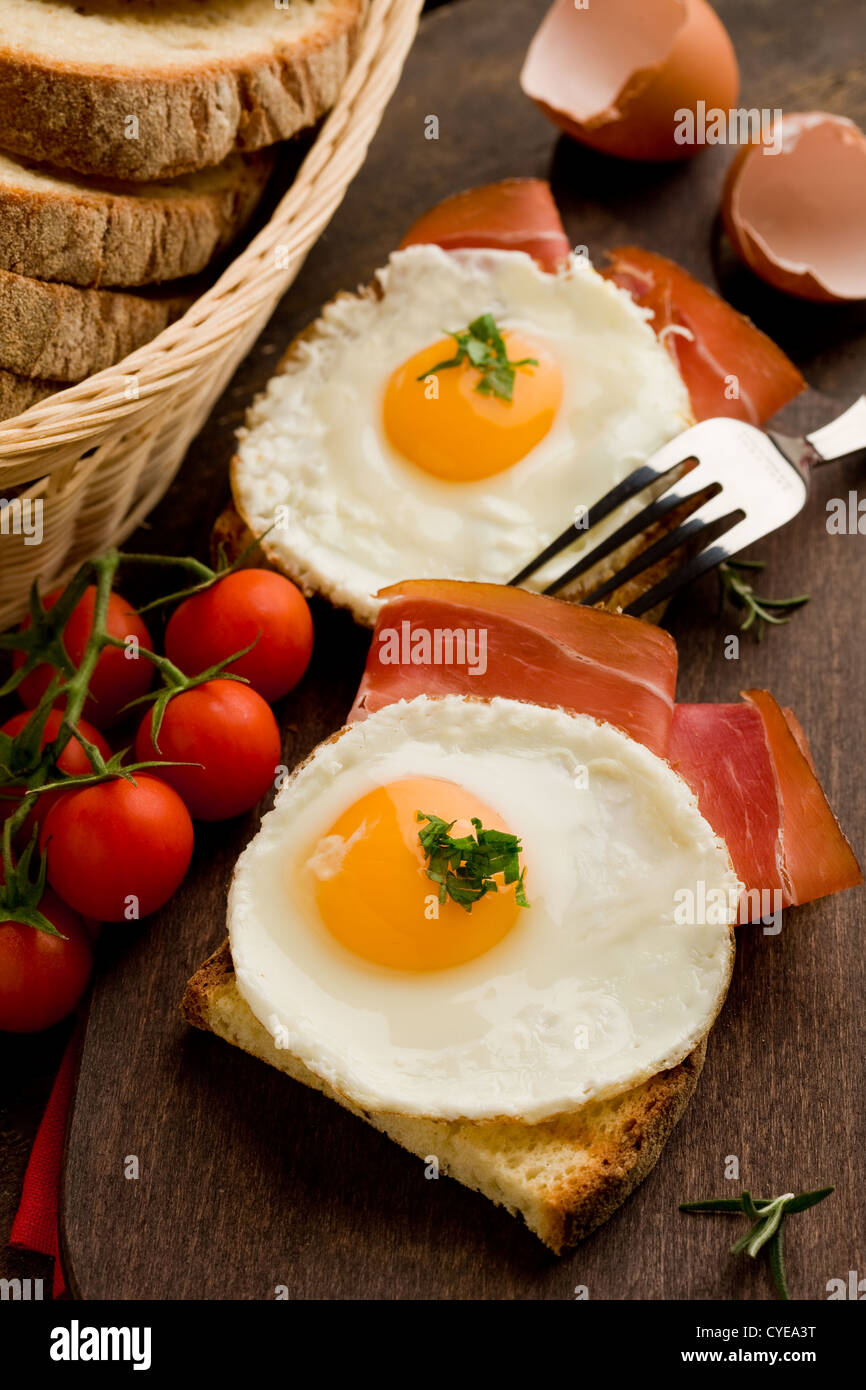 conceptual photo of english breakfast with fried eggs and bacon on ...