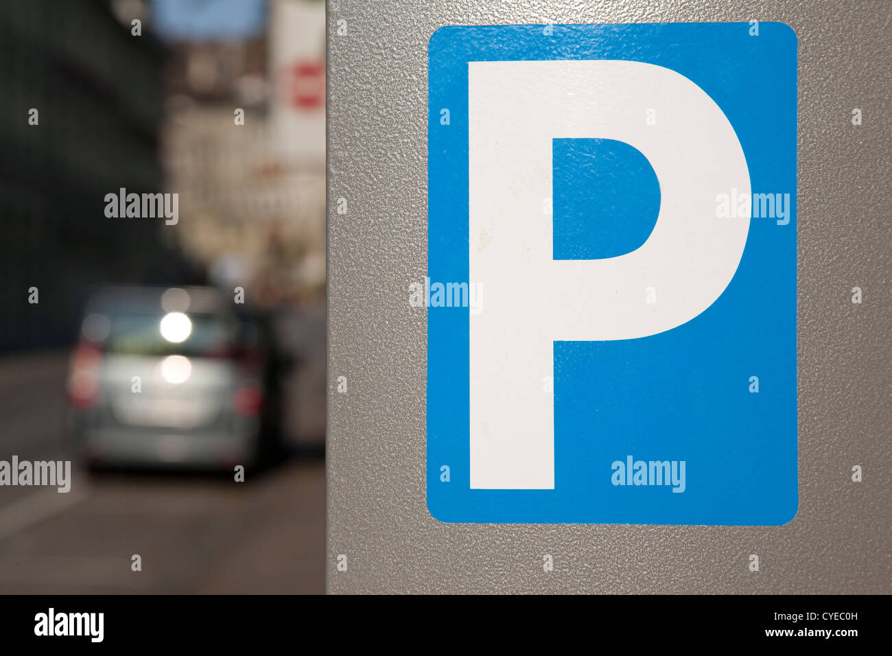 Blue Parking Sign in Urban Setting Stock Photo - Alamy