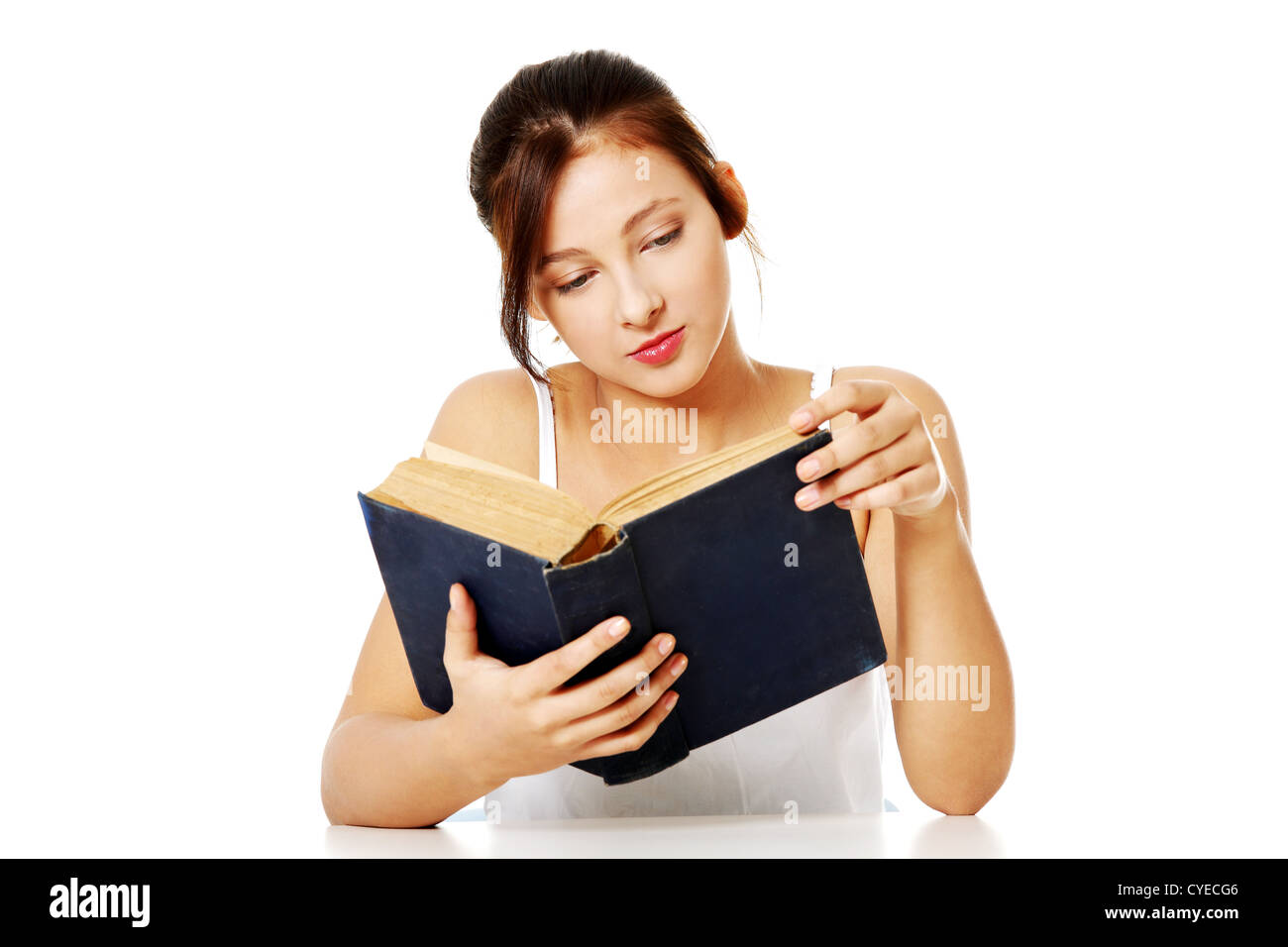 Pretty girl reading a book Stock Photo - Alamy