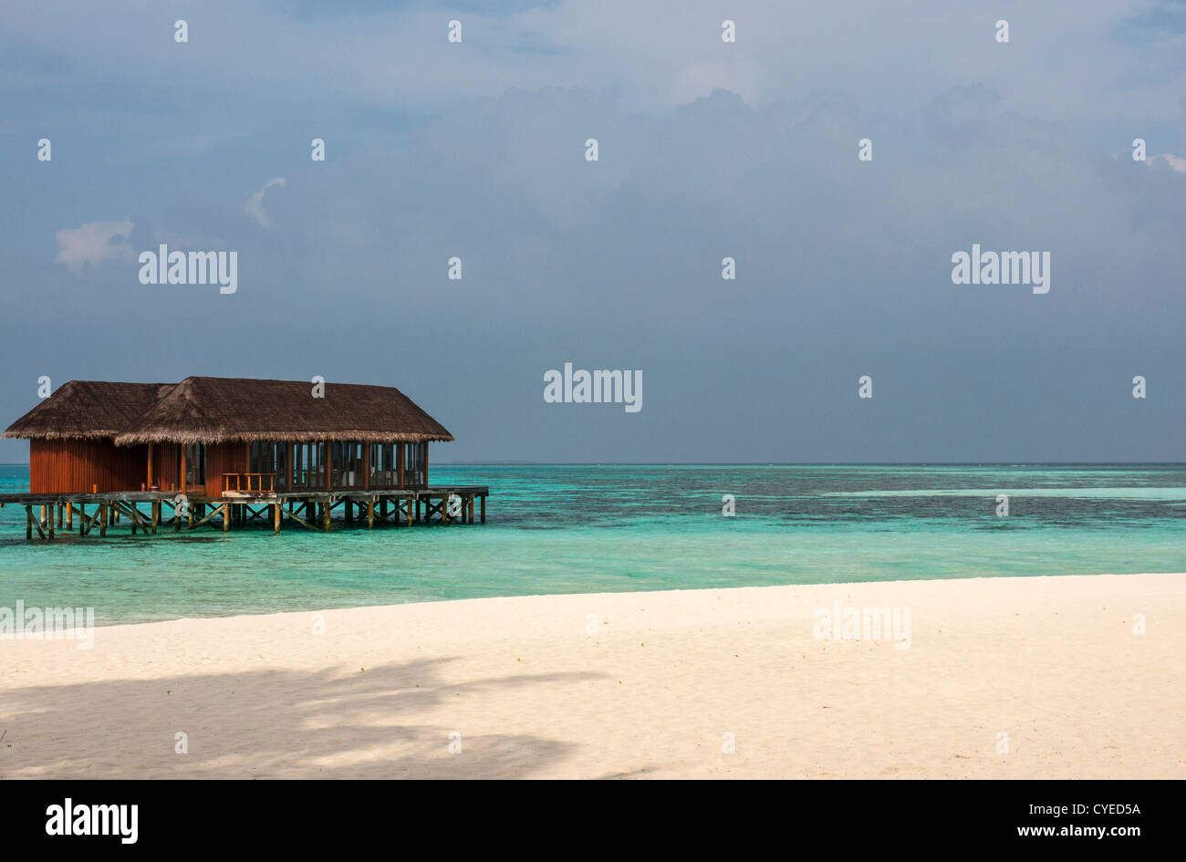 Overwater restaurant in beautiful blue lagoon, Maldives Stock Photo - Alamy