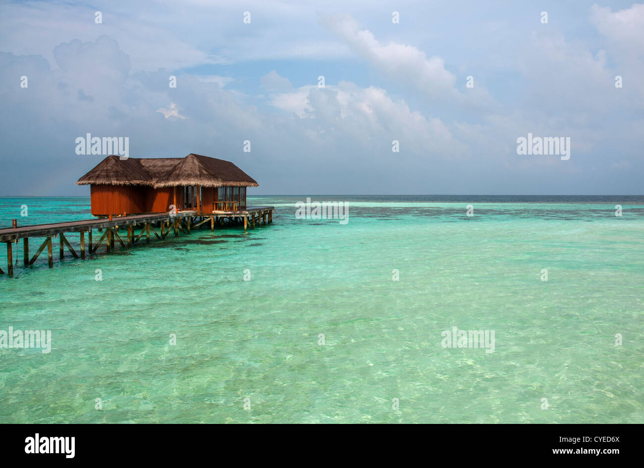 Overwater restaurant in beautiful blue lagoon, Maldives Stock Photo - Alamy