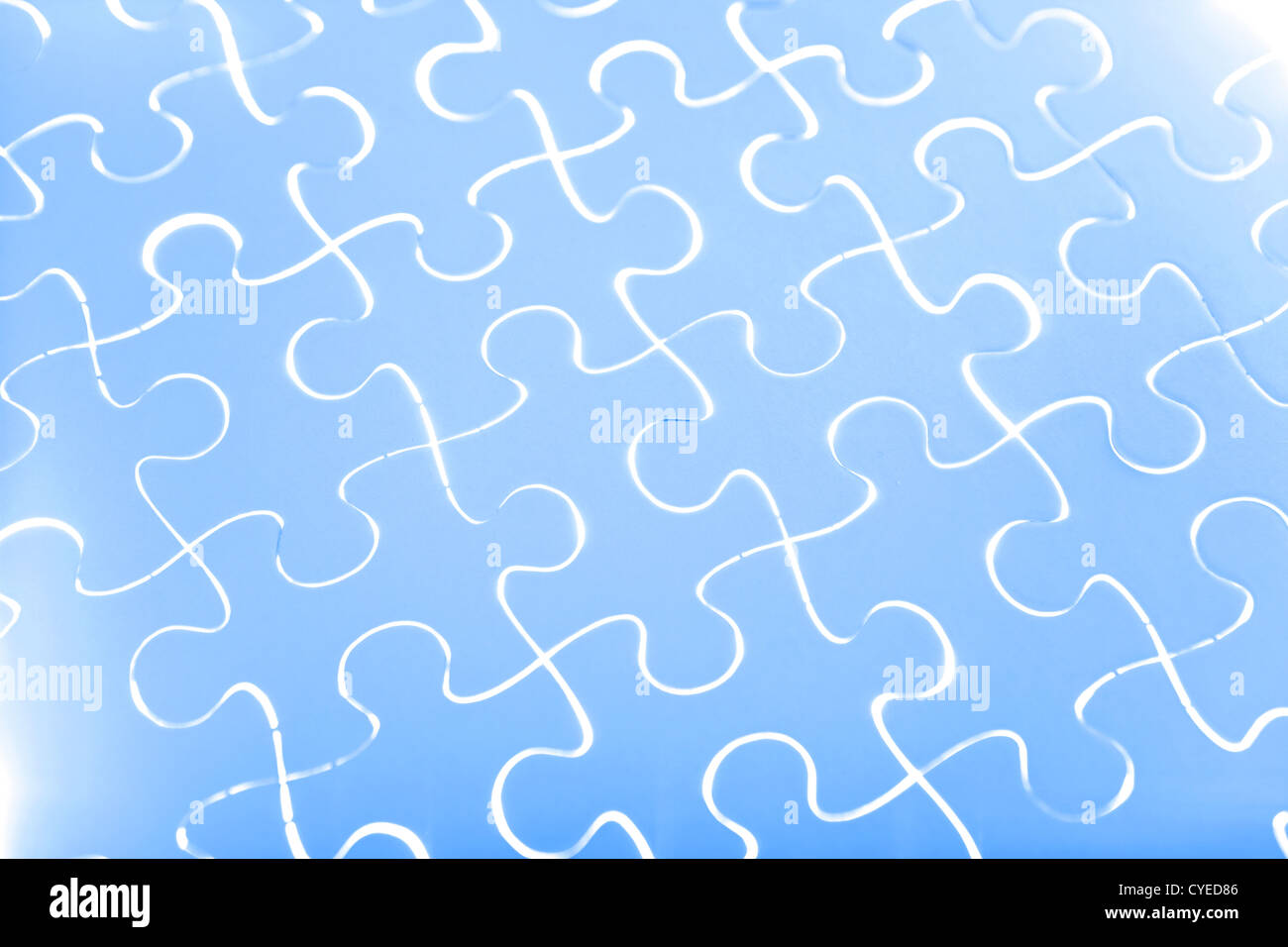 Puzzle in blue Stock Photo - Alamy