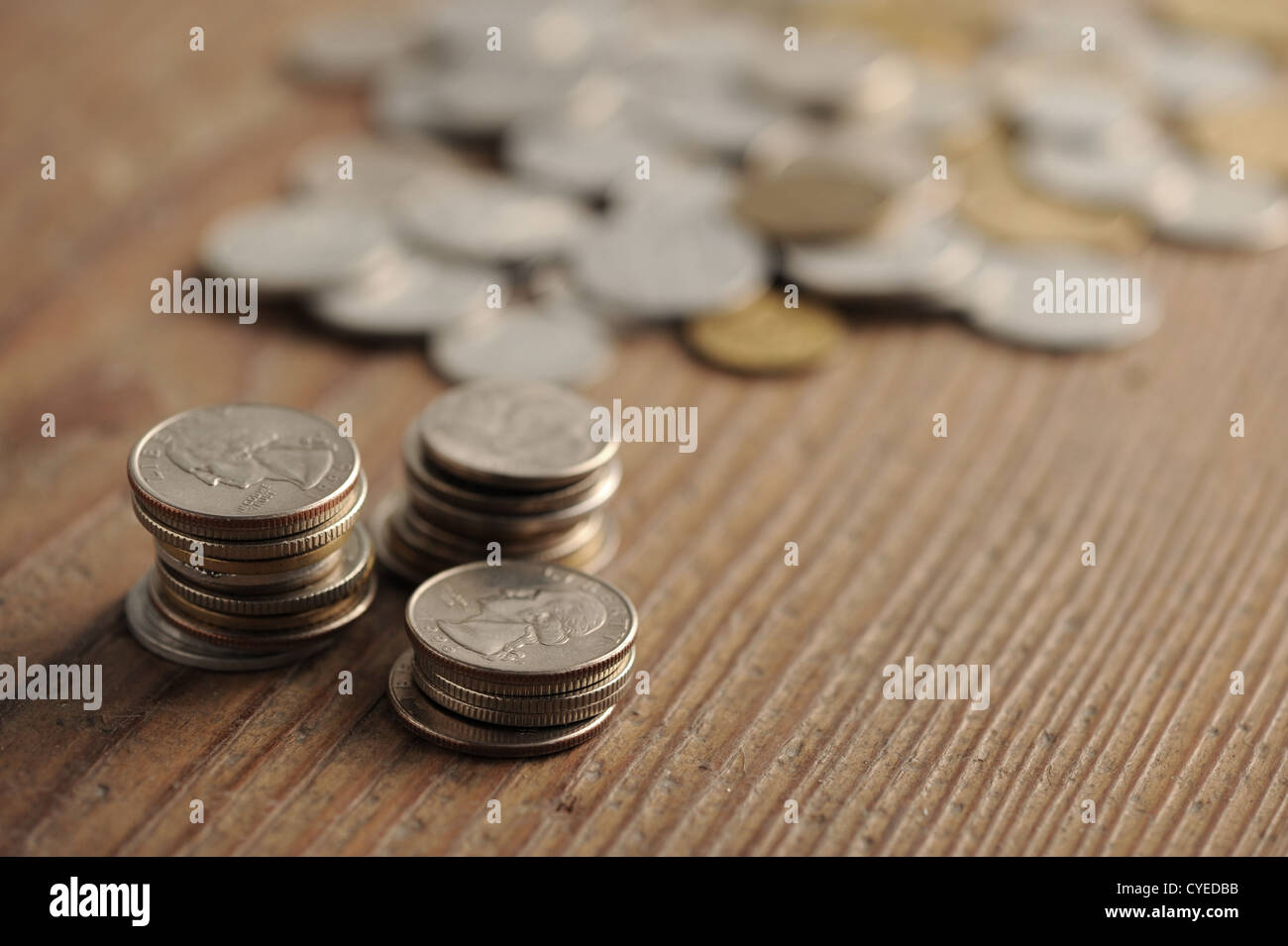 old coins on the wooden table, shallow dof Stock Photo - Alamy