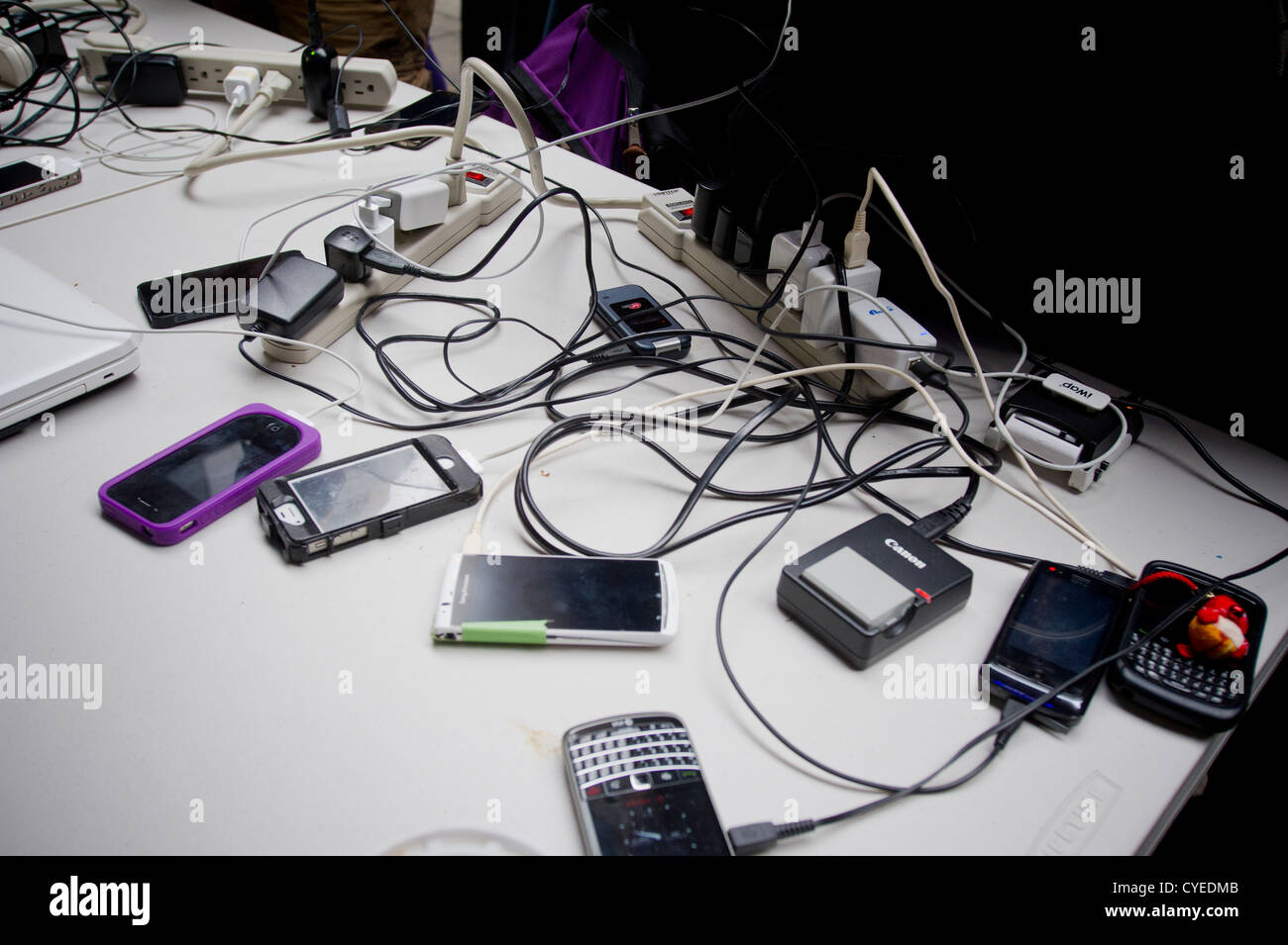 A 7-Eleven store sets up charging stations outside it's store for ...