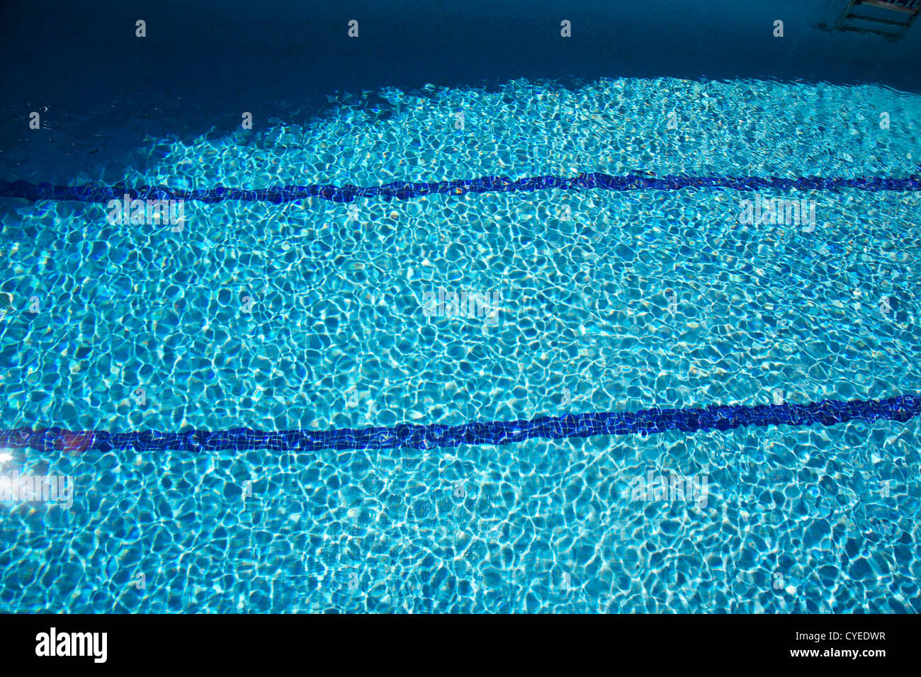bottom of swimming pool with blue transparent water Stock Photo - Alamy