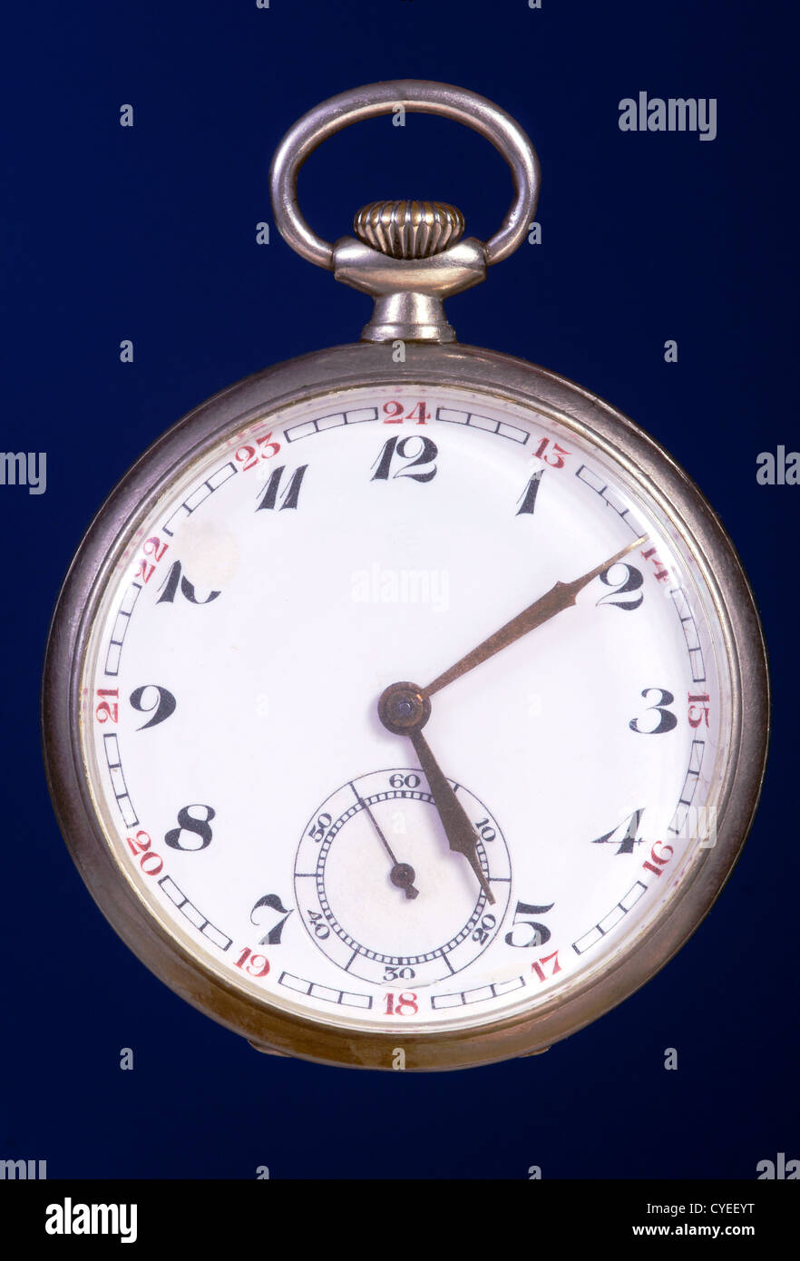 fob watch on blue background Stock Photo - Alamy