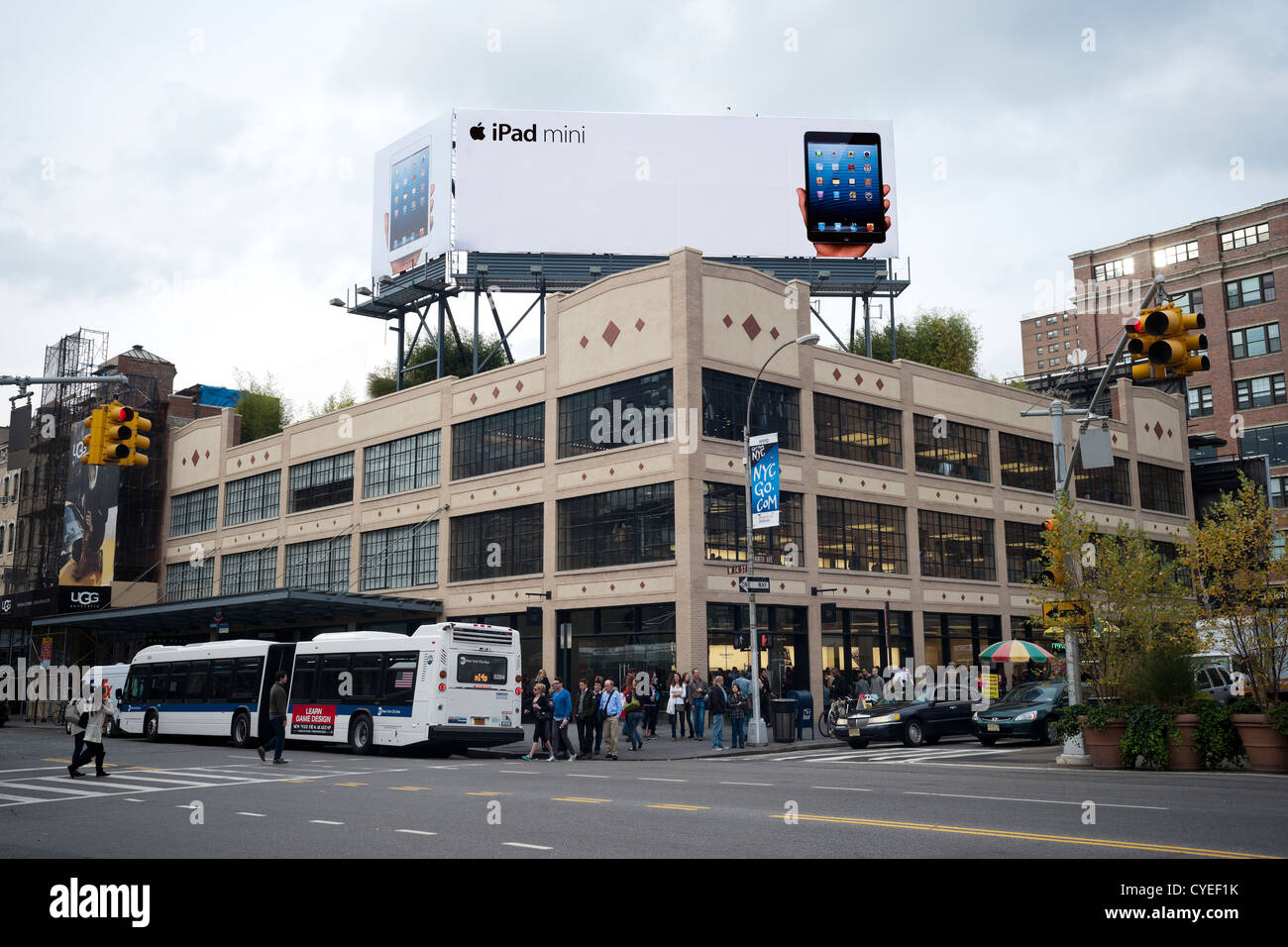 Advertising for the Apple iPad Mini on a billboard atop the Apple store ...