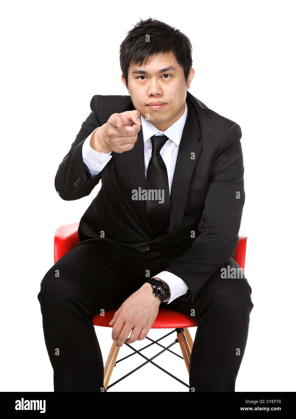 business man sit and point to you Stock Photo - Alamy