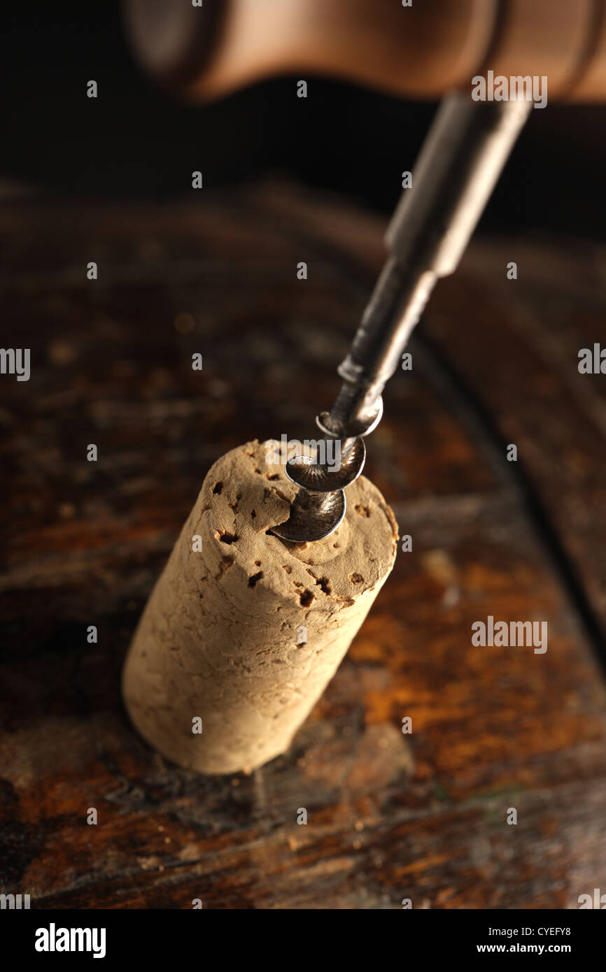 corkscrew and wooden barrel, close up Stock Photo - Alamy