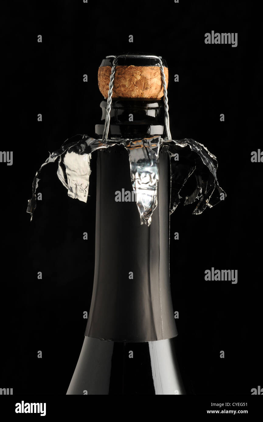 sparkling wine cap on black background Stock Photo - Alamy