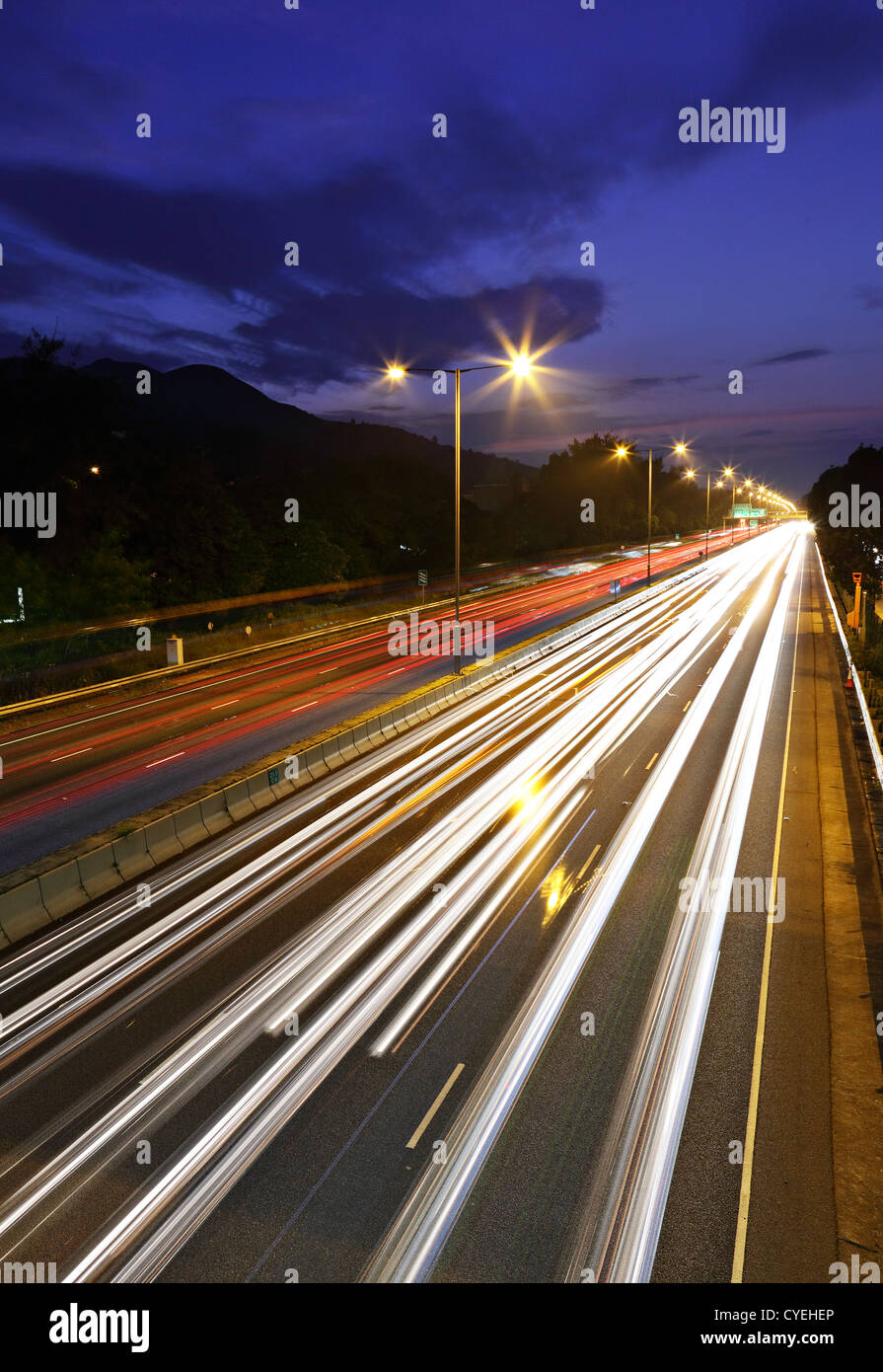 traffic on highway at night Stock Photo - Alamy