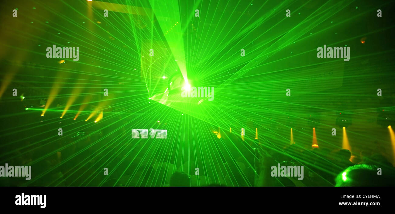 Colored laser party in entertainment disco club Stock Photo - Alamy