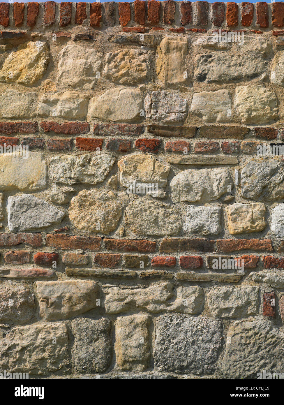 Wall of rocks and bricks, wide and detail Stock Photo - Alamy