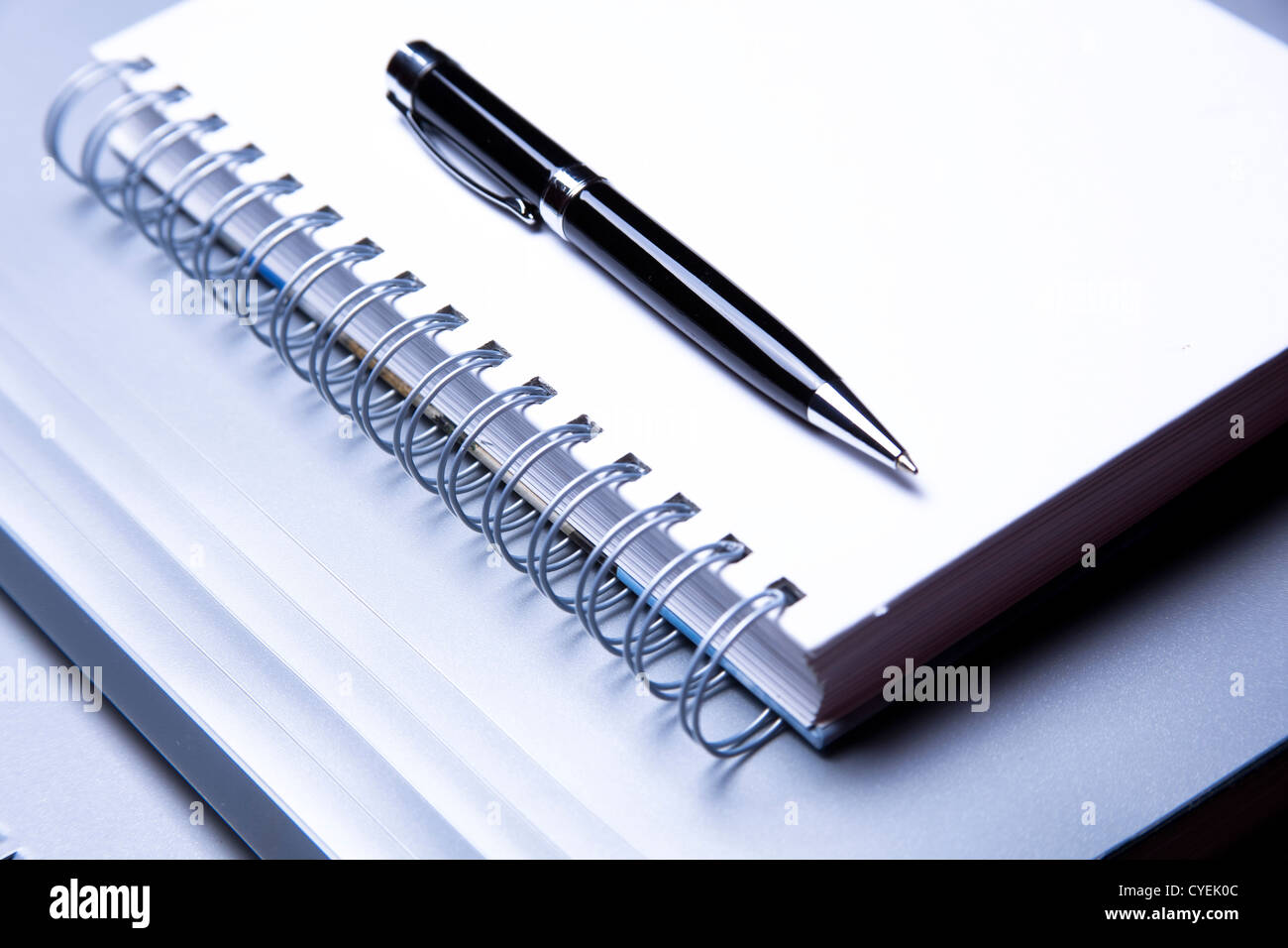 Address book with metal spiral, white paper Stock Photo - Alamy