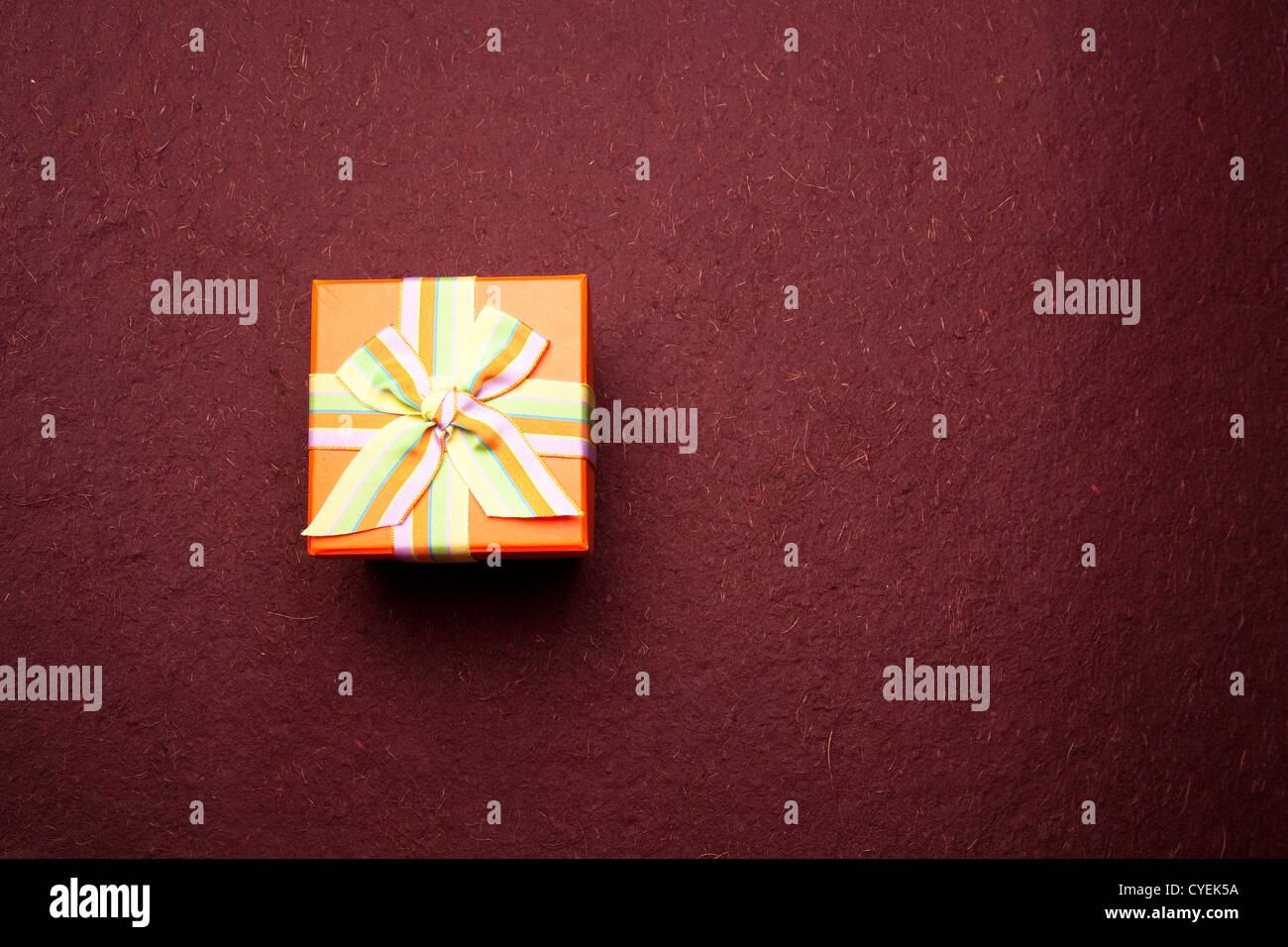 Orange Box With Ribbon Stock Photo - Alamy