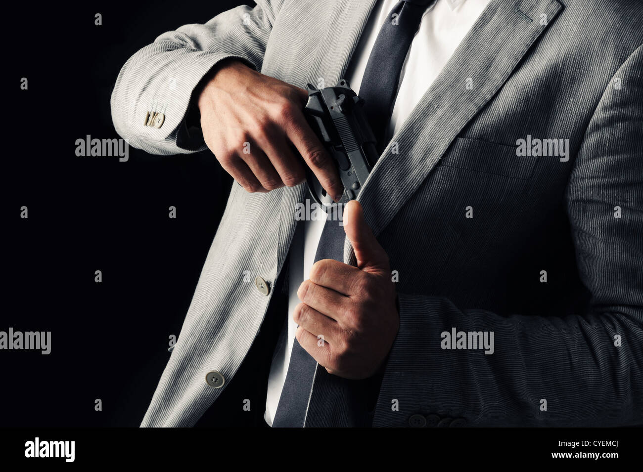 Secret gun hi-res stock photography and images - Alamy