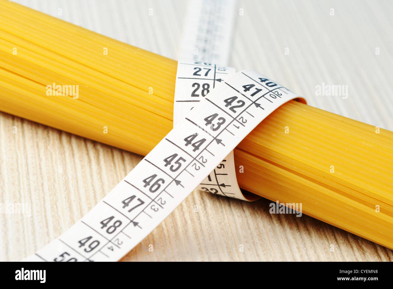 diet concept, Spaghetti with measuring tape Stock Photo - Alamy