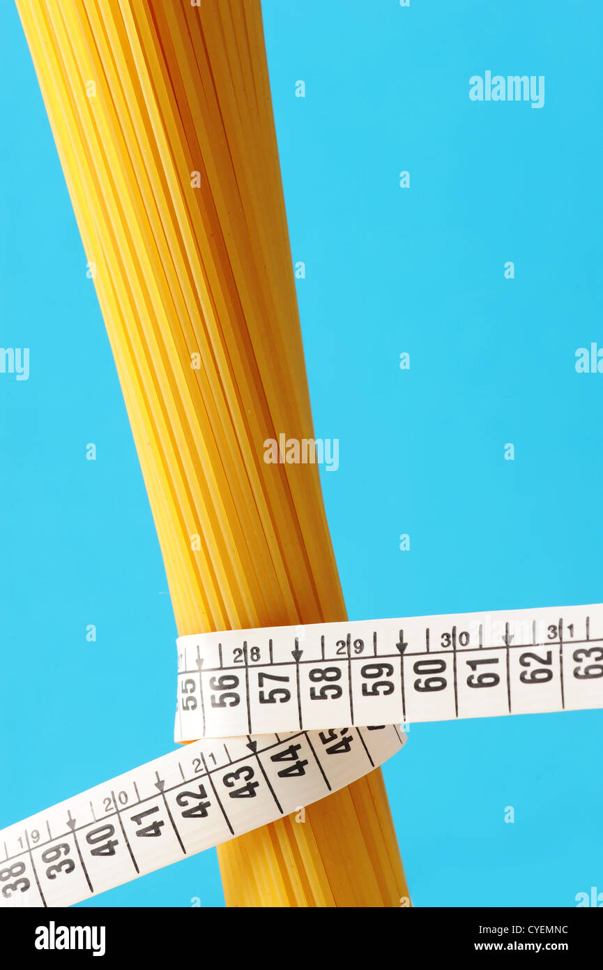 diet concept, Spaghetti with measuring tape Stock Photo - Alamy