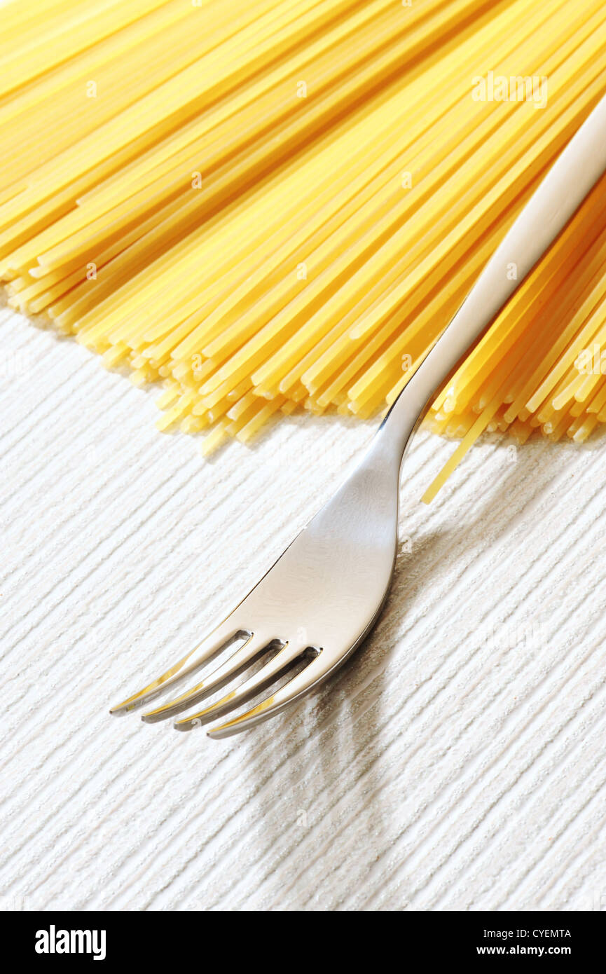 uncooked spaghetti noodles . Italian pasta Stock Photo - Alamy