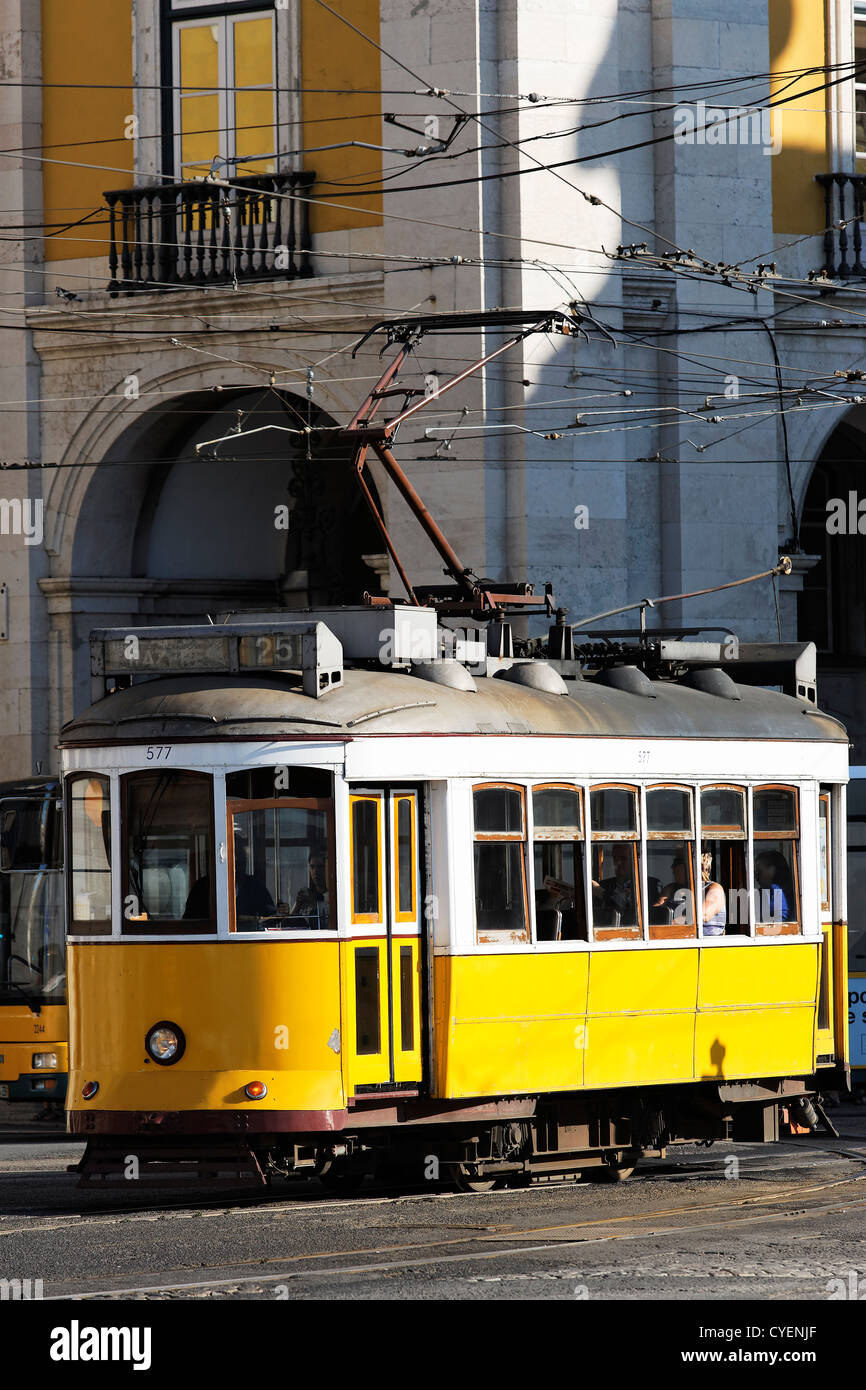 Typical yellow Tram in old street, Lisbon Stock Photo - Alamy