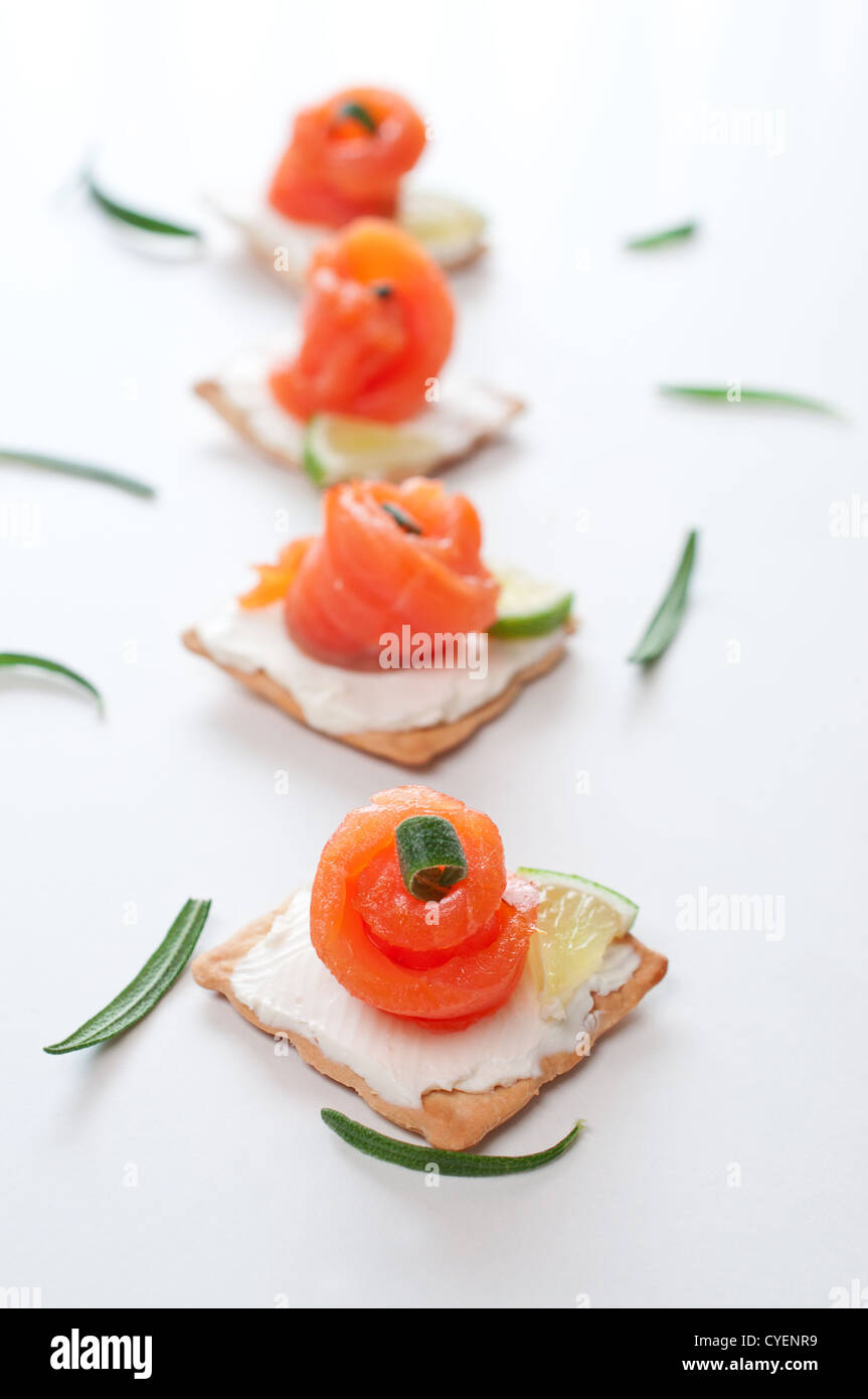 Canapes with smoked salmon and cream cheese on white Stock Photo - Alamy