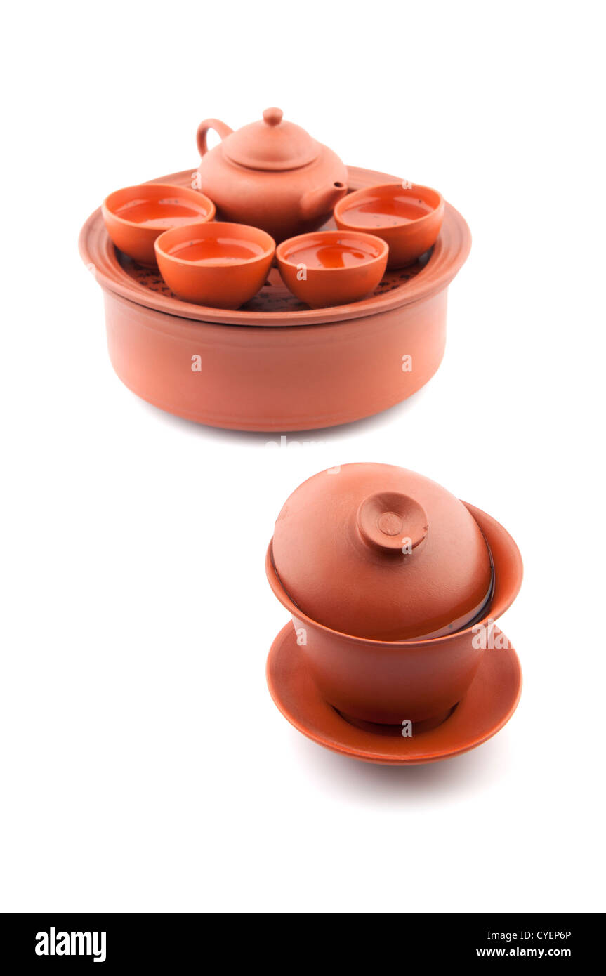 Chinese ceramic tea set and cups on white background Stock Photo - Alamy