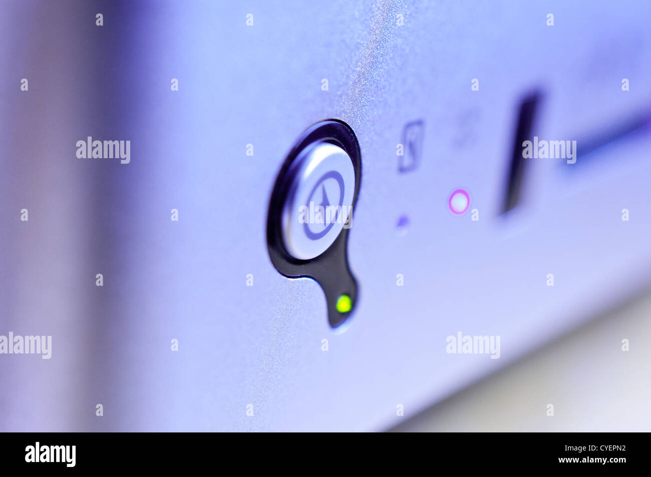 Close up power button on electronic device Stock Photo - Alamy