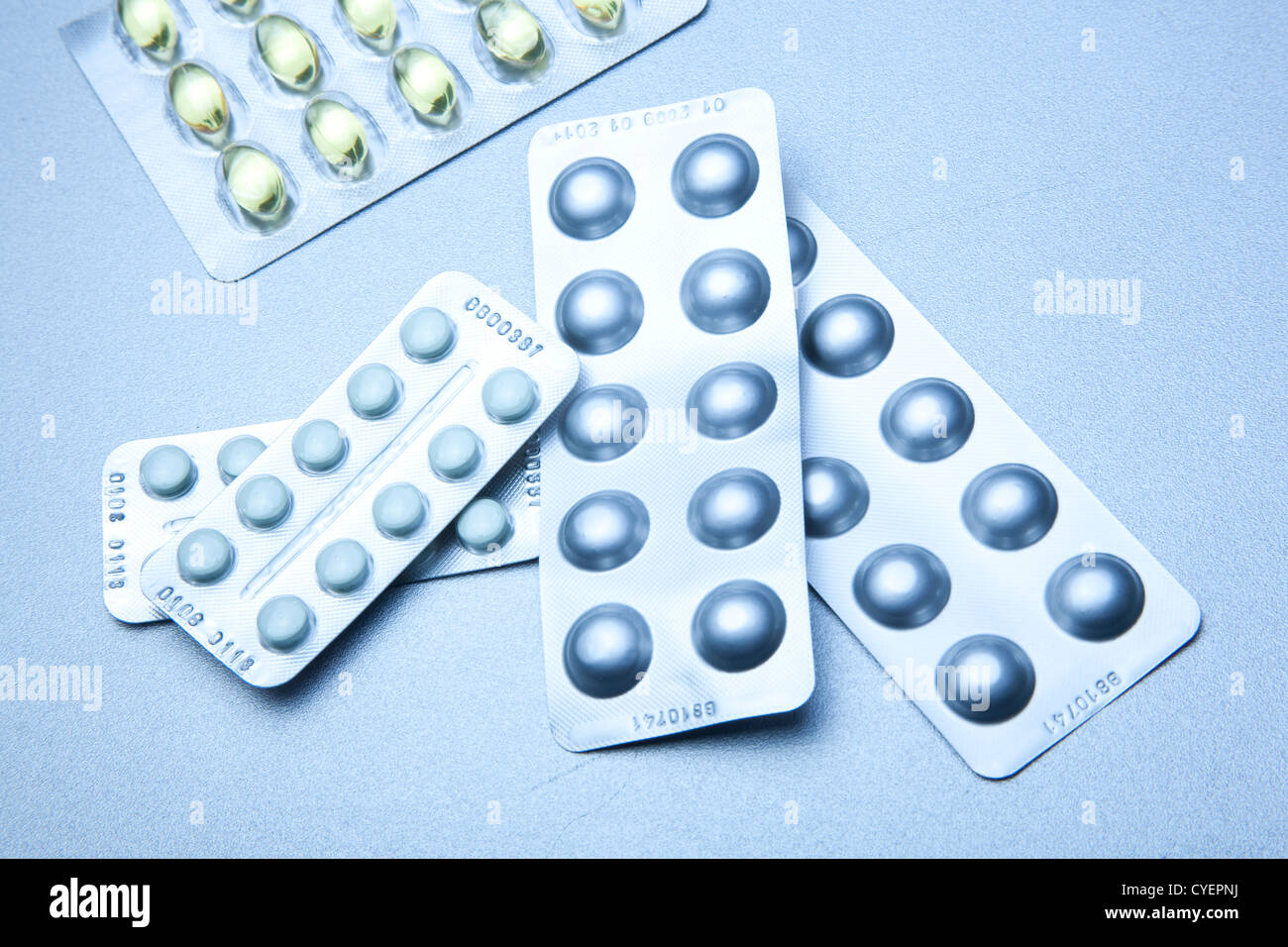 Silver Pills On Metal Table Background, copy space Stock Photo - Alamy