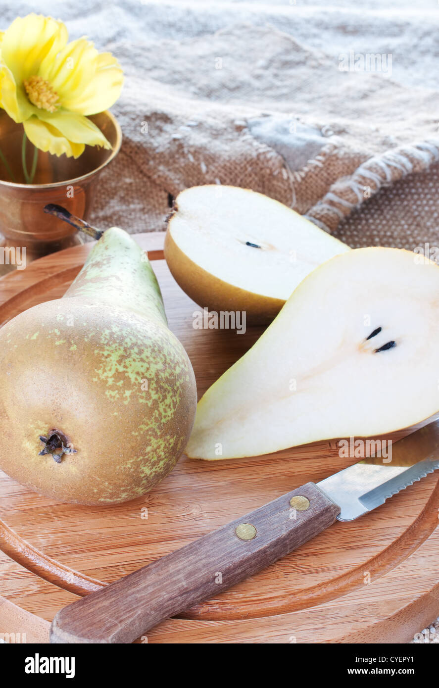 Fresh cutted pears on cutting board Stock Photo - Alamy