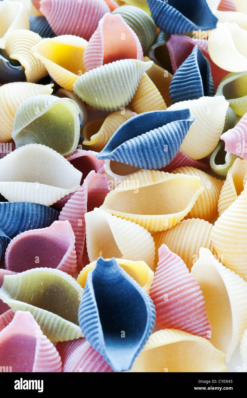 Multi-colored pasta background Stock Photo - Alamy