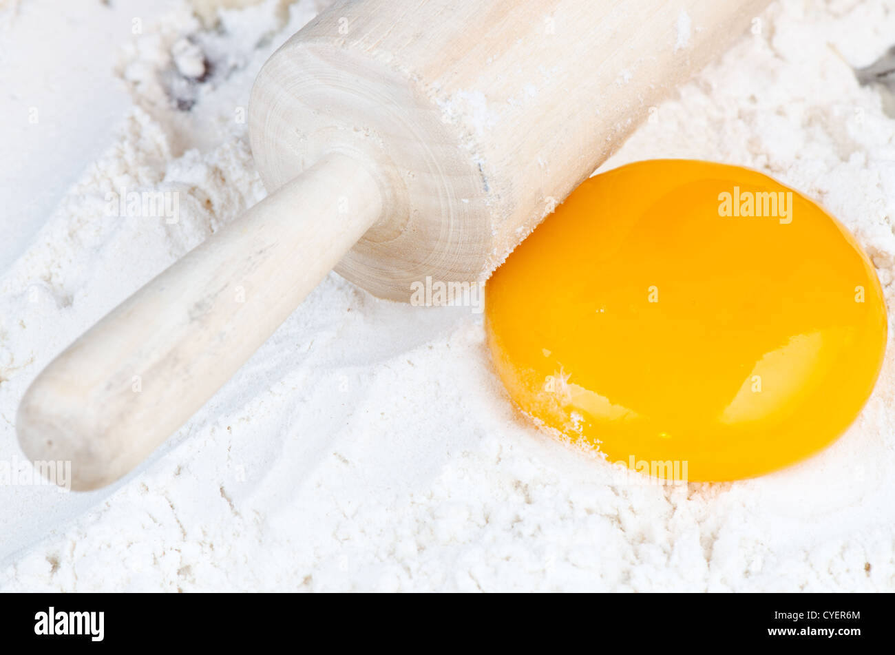 Press dough and yolk close up Stock Photo - Alamy