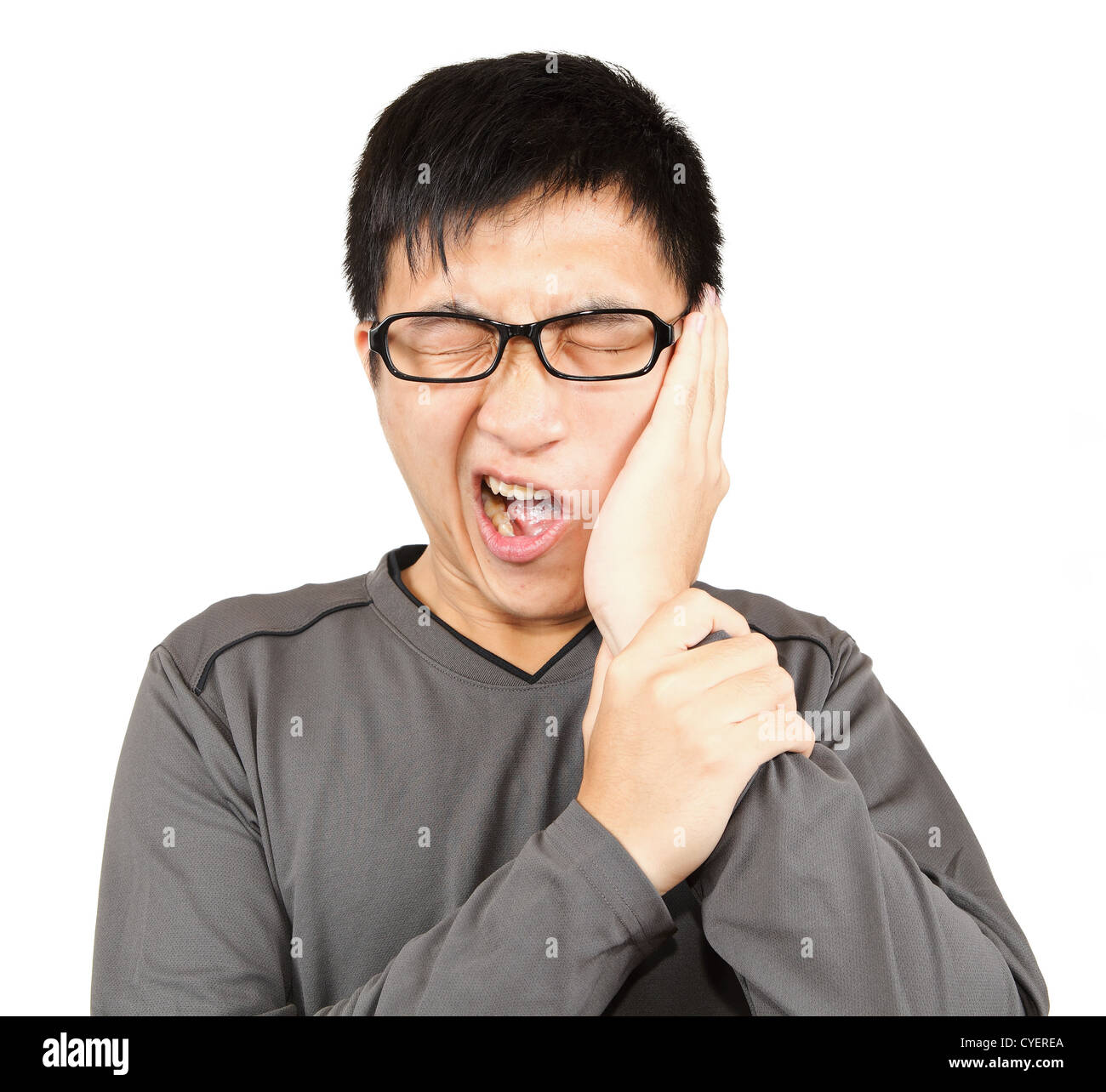 Man with pain expression on white Stock Photo - Alamy